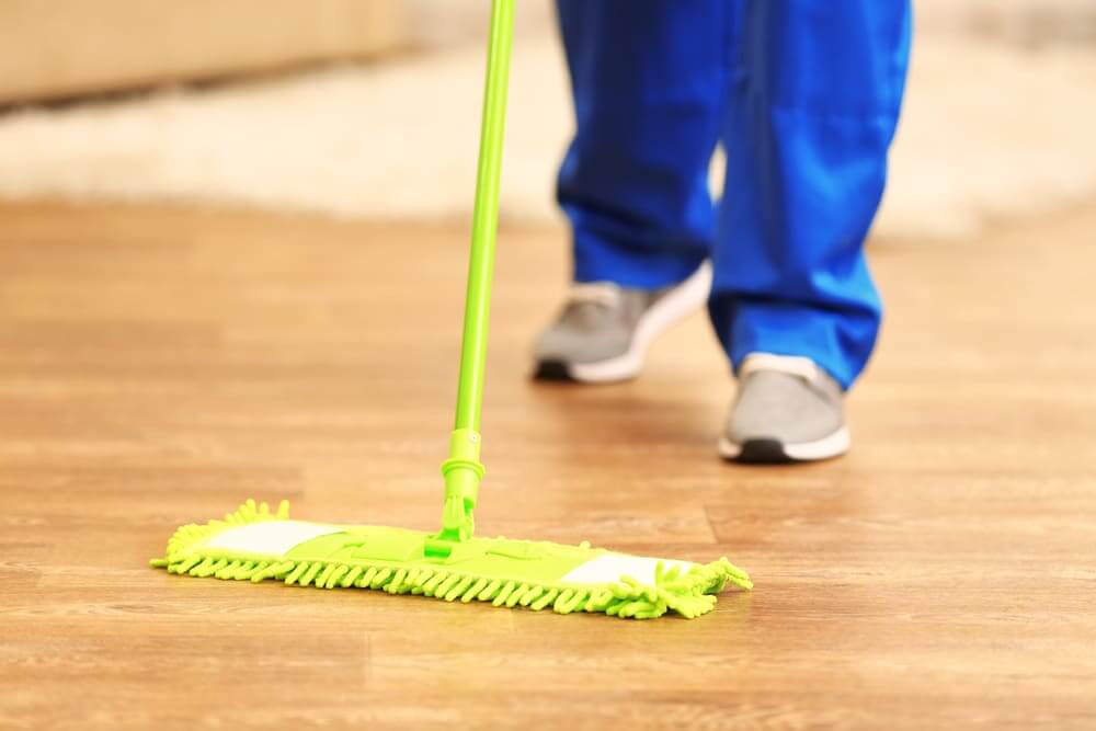Should I mop the wood floor after sanding? - Mr Sander®